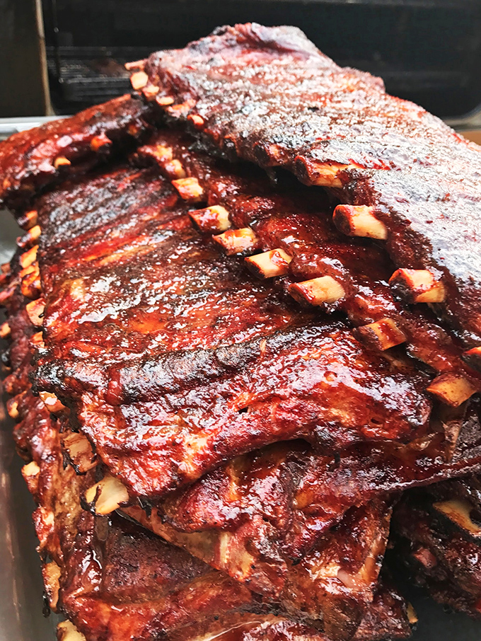 These aren't just ribs—they're edible evidence that patience is indeed a virtue. That bark! That smoke ring! That's barbecue poetry.