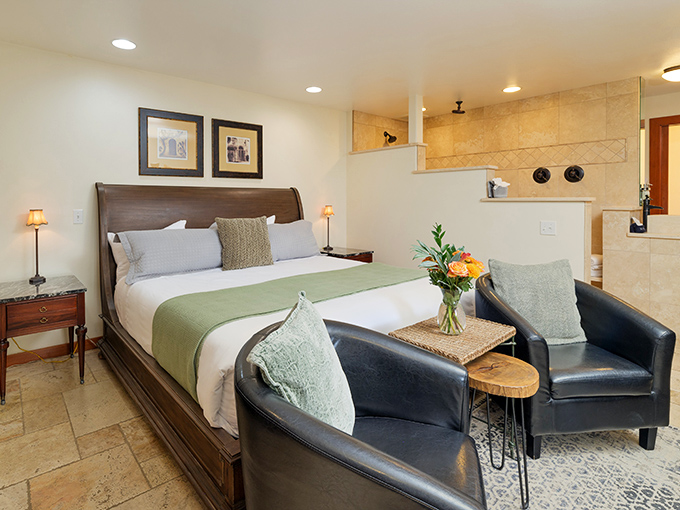 Gardens bloom in vibrant profusion around the castle walls, creating a colorful moat of flowers that changes with the seasons.