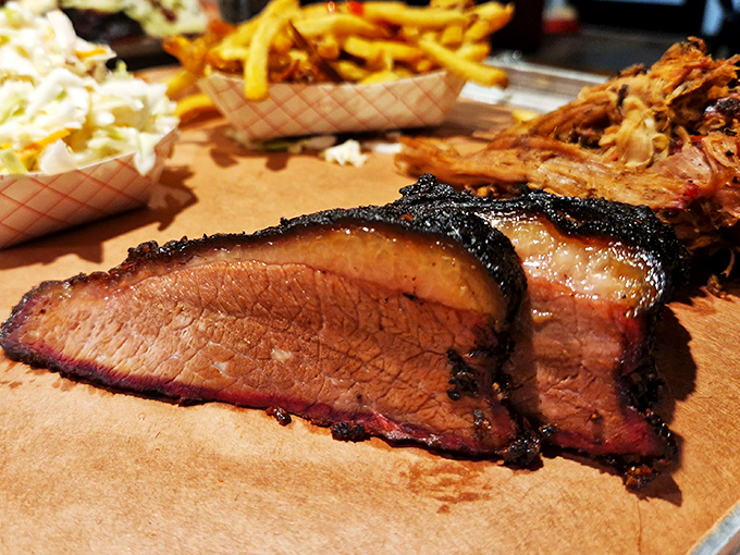 Behold the brisket &ndash; that smoke ring is the BBQ equivalent of a Rolex, signaling hours of patient craftsmanship and mouthwatering luxury.
