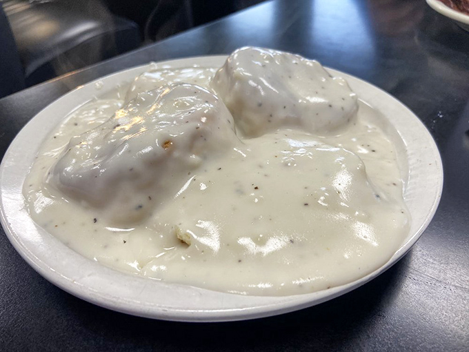These biscuits and gravy aren't just a dish&mdash;they're an edible hug. The peppery cream sauce blankets those homemade biscuits like a warm Southern embrace.
