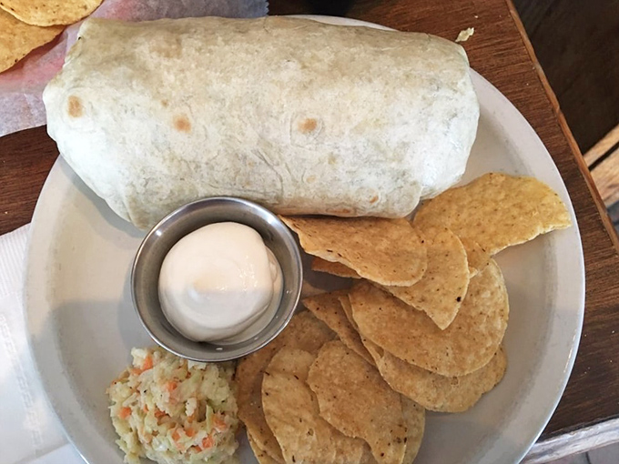 This isn't just a burrito&mdash;it's edible architecture. The perfect ratio of filling to tortilla, with a side of homemade slaw and chips that aren't an afterthought.