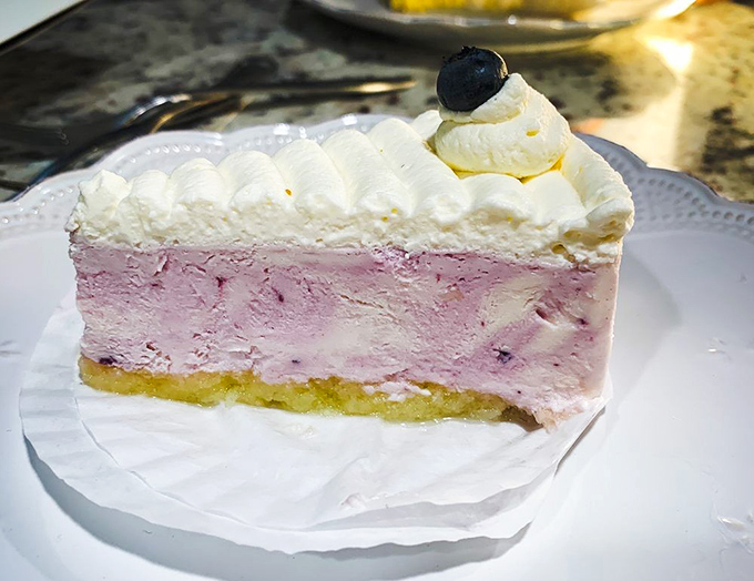 The blueberry cheesecake doesn't just sit on the plate&mdash;it performs. Lighter than a cloud and prettier than most wedding cakes I've attended.