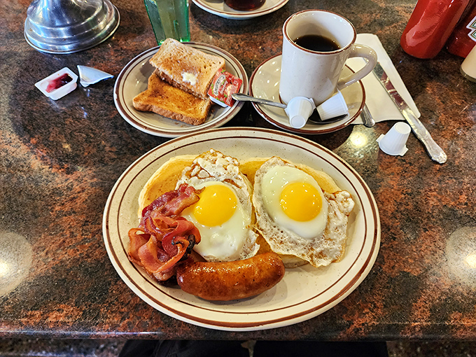 Two sunny-side-up eggs with perfectly crisped bacon&mdash;the breakfast that's launched a thousand New York mornings and cured countless late nights.