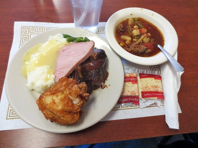 This isn't just dinner, it's edible artwork&mdash;broasted chicken, ham, and mashed potatoes forming a holy trinity of comfort.