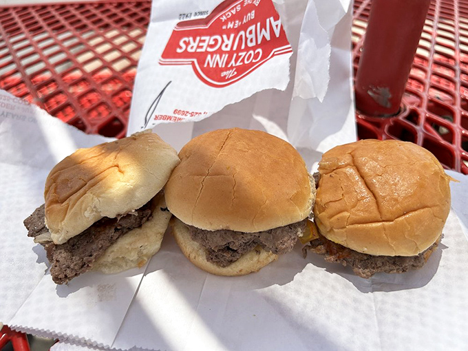 Three perfect specimens of burger artistry. Small in stature but mighty in flavor, these sliders are Kansas' answer to White Castle.