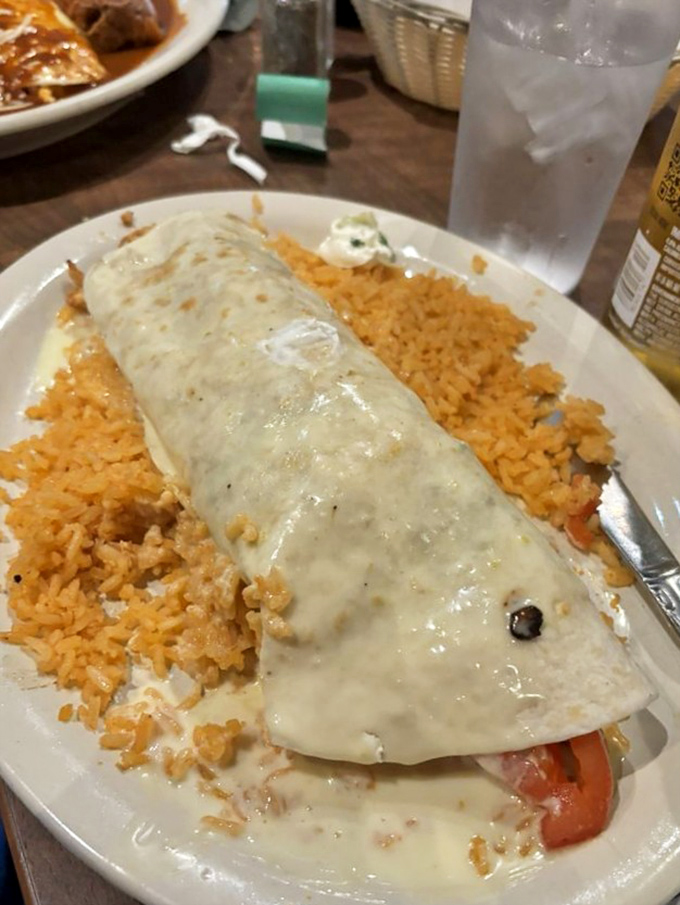 Not all heroes wear capes&mdash;some wear cheese sauce. This burrito, smothered in creamy goodness, might just solve all your problems.