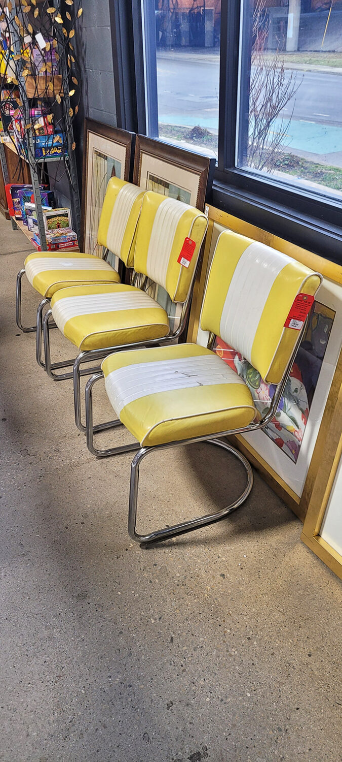 These yellow and white retro chairs aren't just seating—they're time machines to someone's 1970s kitchen where Mom served Tang and discussed Watergate.