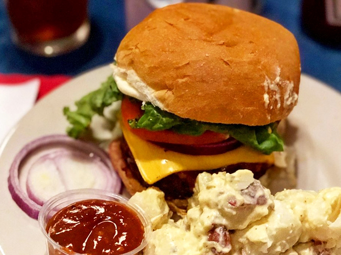This isn't just a burger&mdash;it's architecture. The melted cheese cascades down the patty like a yellow waterfall of joy.