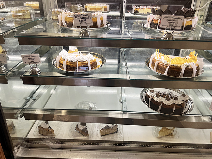 Like a museum of edible masterpieces, each shelf showcases creations that belong in both the Louvre and on your plate.