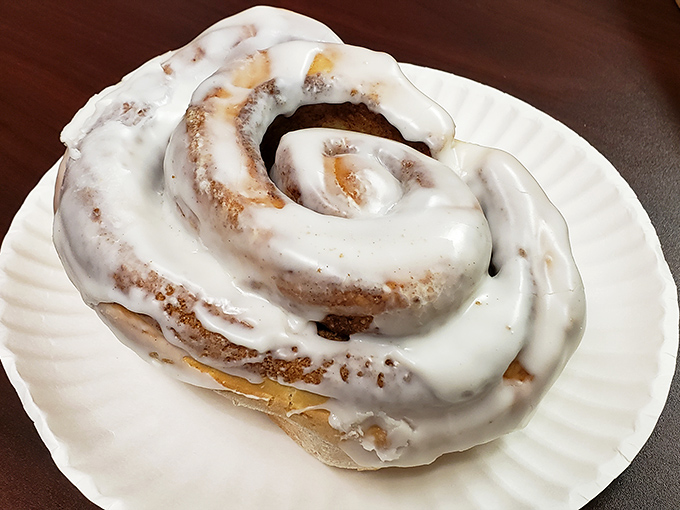The legendary cinnamon roll in all its glory &ndash; a spiral of happiness topped with cream cheese frosting that makes Monday mornings bearable again.