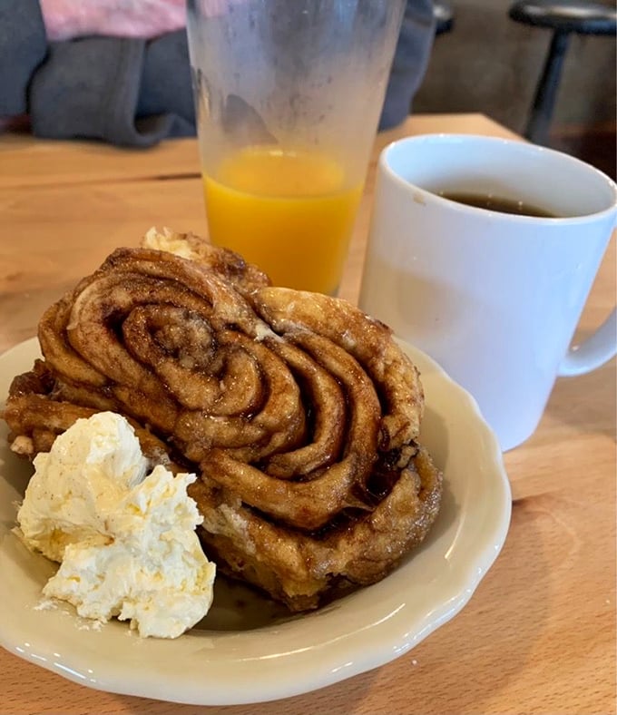 This cinnamon roll isn't just breakfast &ndash; it's an event. With a dollop of butter melting into those warm, spiced swirls, it's what breakfast dreams are made of.