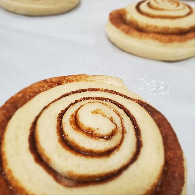 These aren't just cinnamon rolls&mdash;they're spiral-shaped happiness, the kind that makes you close your eyes and momentarily forget your own name.