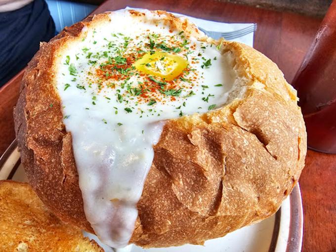 A bowl of creamy chowder with buttery toast&mdash;the kind of simple perfection that makes you wonder why you'd ever eat anything else.
