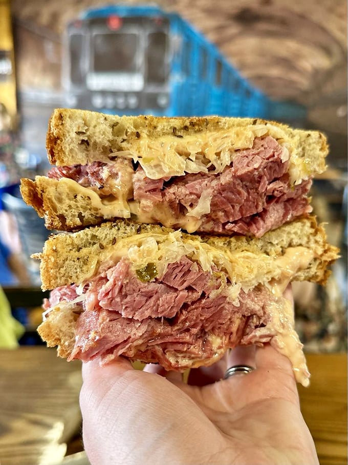 This isn't just a sandwich—it's architecture. Layers of corned beef and sauerkraut create a skyscraper of flavor that would make any New Yorker homesick.
