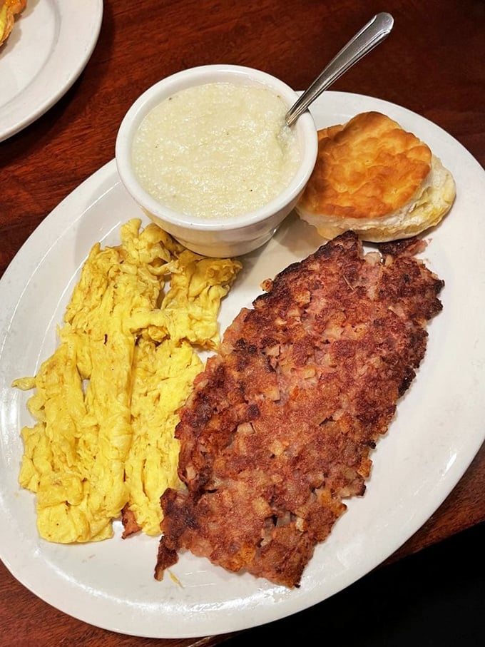 Corned beef hash with that perfect crispy-to-tender ratio alongside fluffy scrambled eggs. Comfort food that makes Monday mornings bearable again.