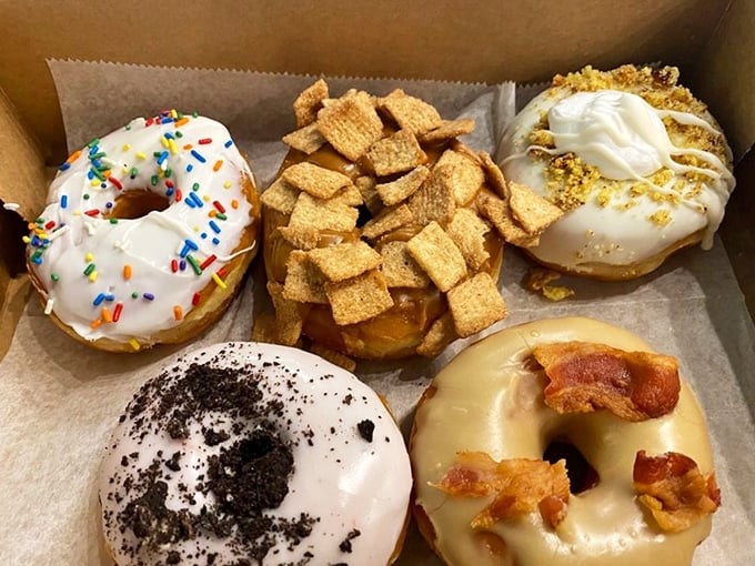 A box of edible joy featuring classics reinvented: sprinkles that actually taste good, Cinnamon Toast Crunch magic, cookies and cream, and the bacon masterpiece that makes breakfast jealous.