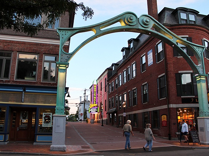 The distinctive teal arch welcomes visitors to Portsmouth's Market Square, where brick-lined streets have witnessed everything from colonial commerce to first dates.