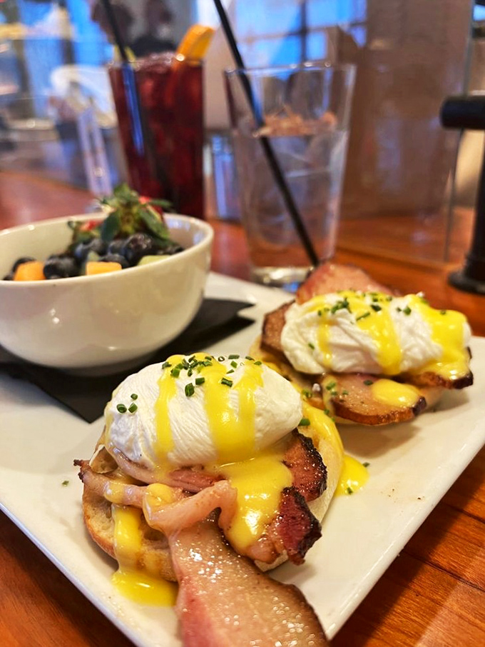 Eggs Benedict elevated to art form status. Those perfectly poached eggs draped in sunshine-yellow hollandaise make breakfast feel like a special occasion worth setting an alarm for.