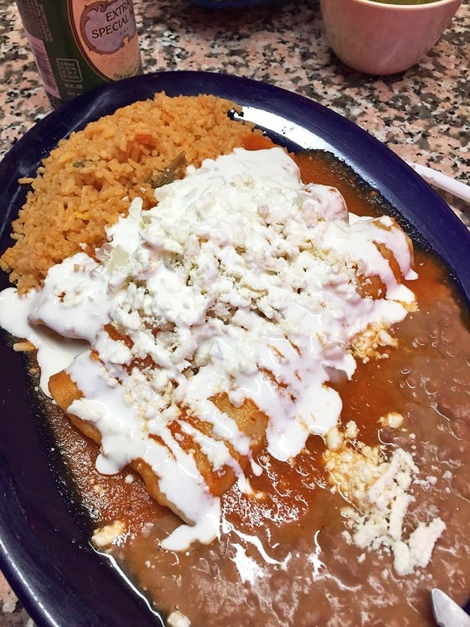 This isn't just an enchilada&mdash;it's edible architecture. The perfect ratio of sauce to cheese to filling, with rice playing a supporting role.