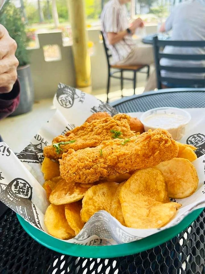Golden, crispy perfection on a plate. This fish and chips doesn't need a passport to transport you straight to coastal bliss.