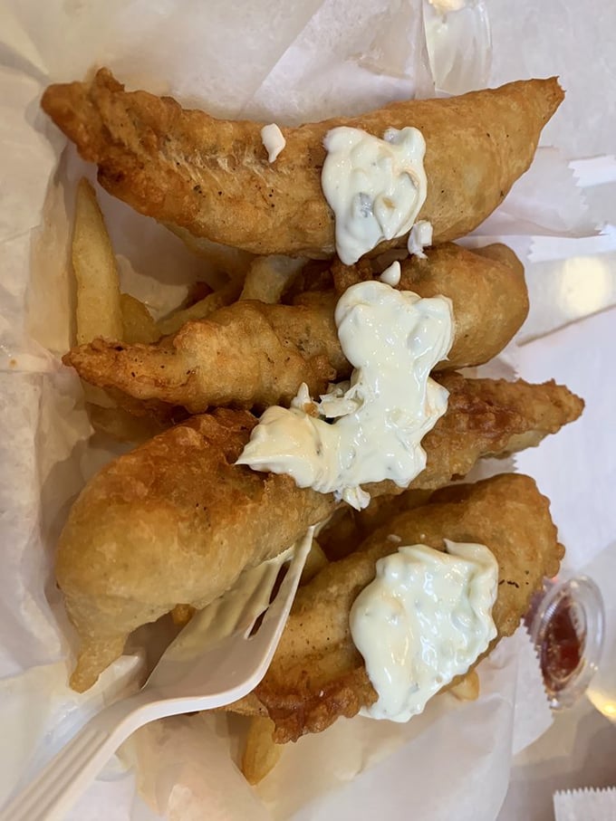 Golden-battered perfection with a dollop of heaven. These fish pieces aren't just fried&mdash;they're transformed into crunchy vessels of joy that would make Neptune himself jealous.