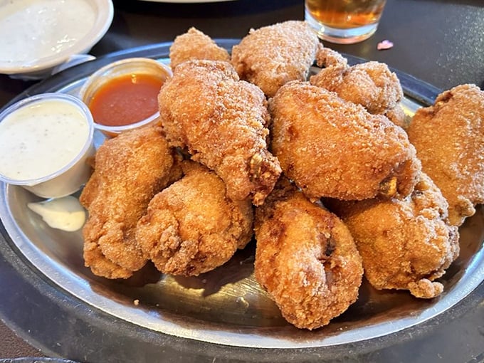 Golden armor of crispy perfection surrounding juicy chicken treasures. This isn't just food; it's edible therapy for the soul.