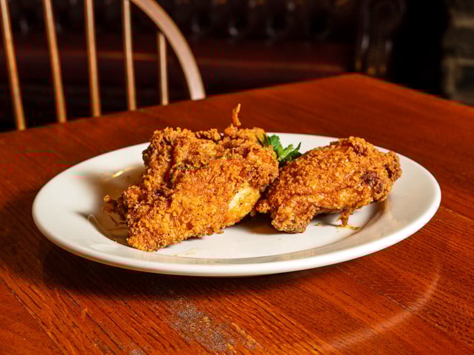 Golden-brown perfection that makes other fried chicken look like it's not even trying. This crispy masterpiece has converted more Yankees than Southern hospitality.
