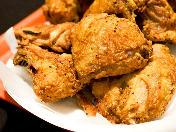 Golden-brown treasures that would make Colonel Sanders weep with envy. This isn't just fried chicken; it's edible artwork with a crunch.