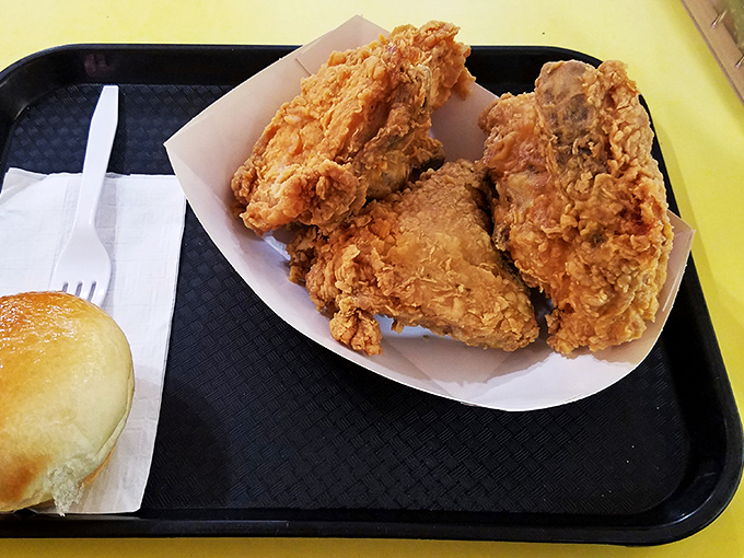 Golden-brown perfection on a simple paper-lined tray. This chicken doesn't need fancy presentation&mdash;it lets the crust do all the talking.