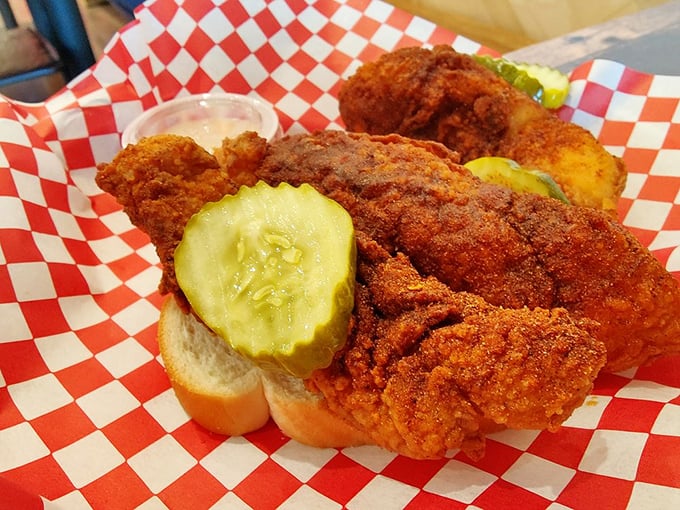 Golden-brown perfection nestled in checkered paper. These tenders aren't just crispy&mdash;they're what other fried chicken dreams of becoming when it grows up.