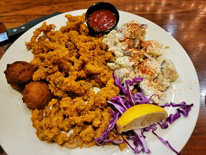 Golden-fried treasure with a splash of color. The perfect seafood platter doesn't exi—wait, yes it does, and it comes with hushpuppies!