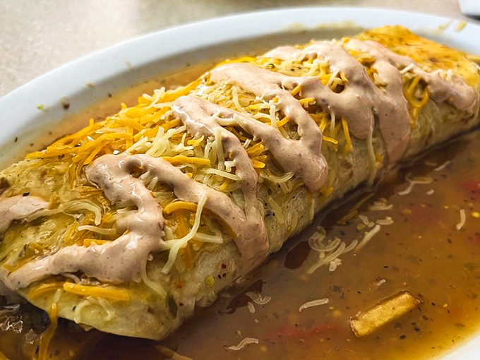 This isn't just a burrito&mdash;it's a masterclass in texture and flavor, swimming in green chili that's worth the drive from anywhere in Colorado.