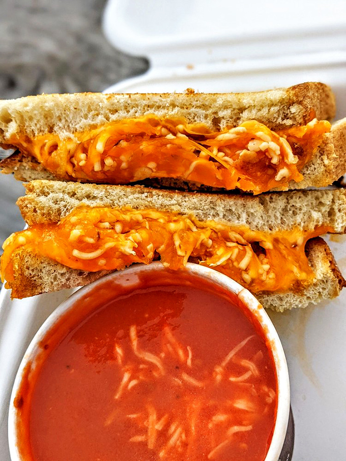 The classic pairing that never goes out of style: a buffalo chicken grilled cheese with tomato soup. Like reuniting childhood sweethearts who've both matured into something even more wonderful. 