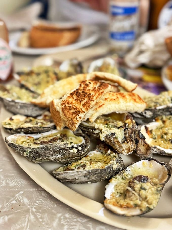 These chargrilled oysters aren't just cooked, they're transformed&mdash;garlic butter sizzling on shells and golden toast standing by for the inevitable sauce-sopping.