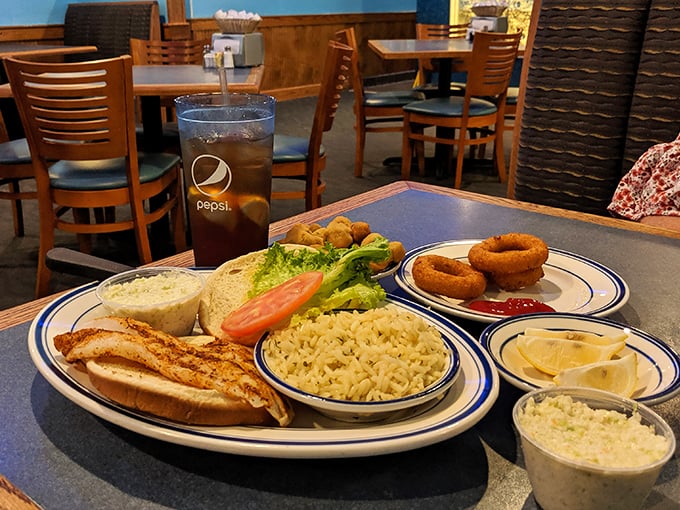 This isn't just a sandwich; it's a masterclass in simplicity. Perfectly grilled fish, fresh toppings, and a side that doesn't know it's playing a supporting role.