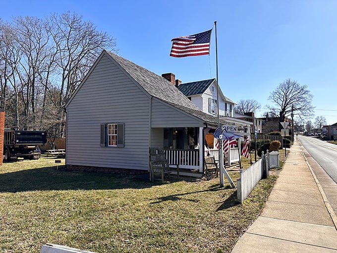 History doesn't just live in museums here&mdash;it's where actual living happens. This charming cottage with its American flag feels like stepping into a Norman Rockwell painting.