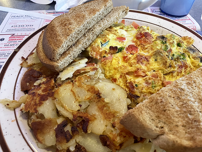 Eggs Benedict with those legendary home fries&mdash;a breakfast duo that performs together better than Simon and Garfunkel ever did. 