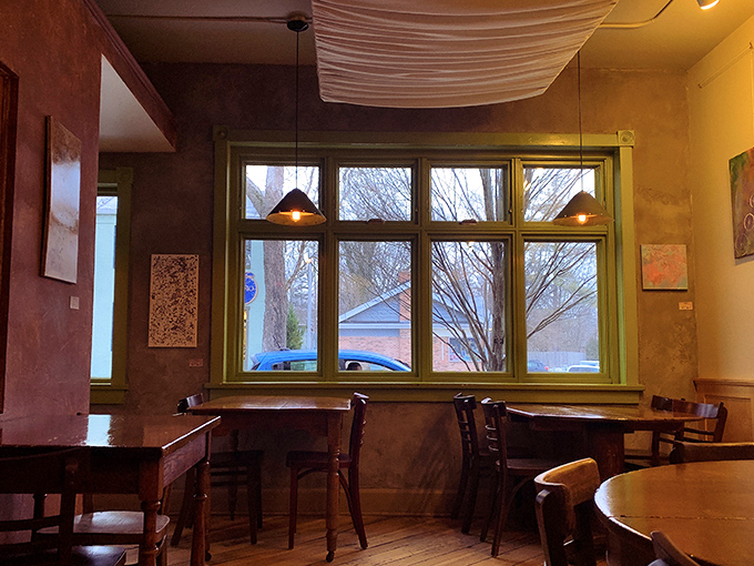 Warm wood, soft light, and local art transform The Winds' dining room into the kind of place where conversations flow as smoothly as the wine.