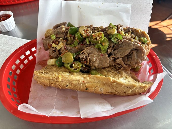 Behold, the Italian beef in all its glory – paper-wrapped, giardiniera-topped, and ready to transform your understanding of sandwich perfection.
