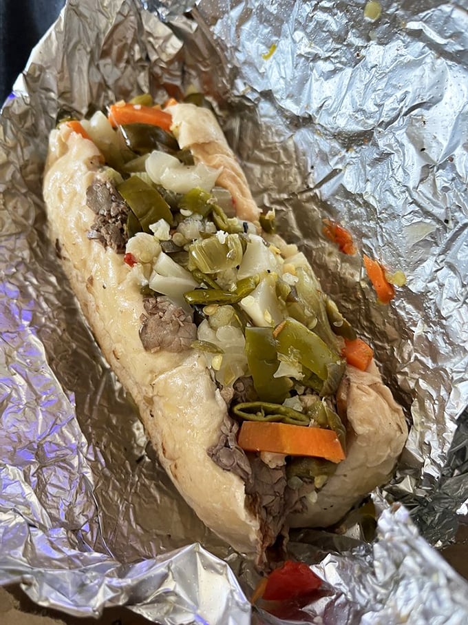 Behold the star attraction: thinly sliced beef, vibrant giardiniera, and bread that performs the miraculous feat of holding together despite the magnificent juice bath.