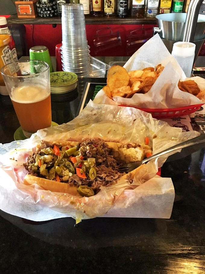 The Italian beef in all its glory &ndash; a beautiful mess of thinly sliced beef, sweet and hot peppers, nestled in a roll that somehow defies the laws of sandwich physics.