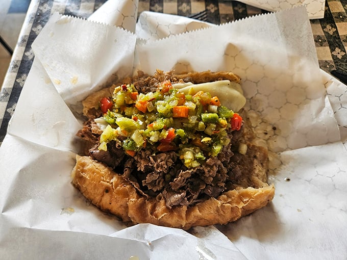 This isn't just a sandwich; it's a masterpiece of beef, giardiniera, and bread that's accepted its delicious, juice-soaked destiny. Napkins required, regrets impossible.