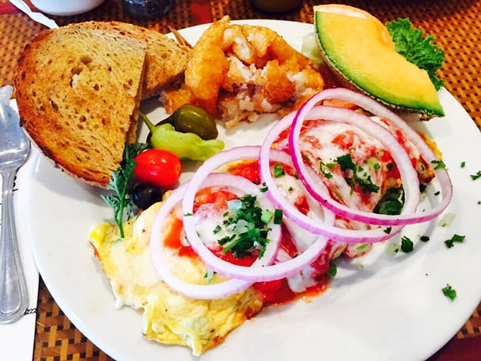 Tomatoes, onions, and herbs transform ordinary eggs into extraordinary art. This Italian omelet doesn't just feed the body—it nourishes the soul.