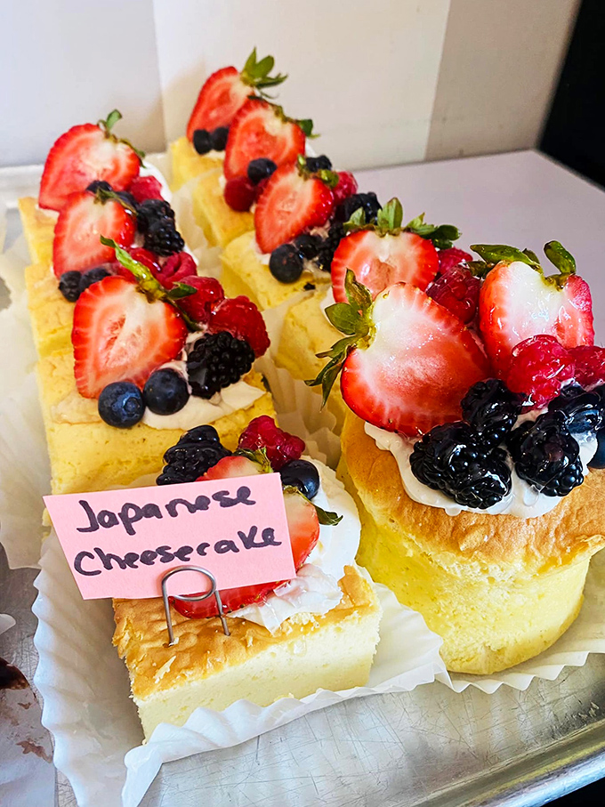 Japanese cheesecake topped with fresh berries&mdash;proof that international diplomacy is best conducted through dessert. Light, jiggly perfection on a plate.