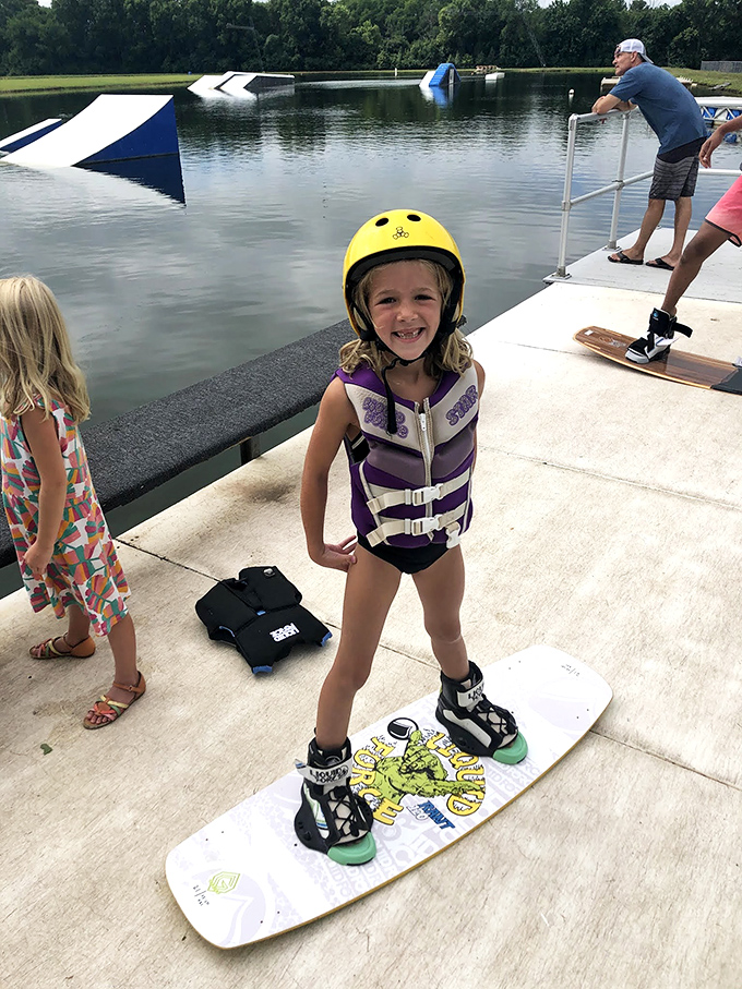 Future wakeboarding champion in training! That smile says everything about the confidence that comes from conquering new challenges.
