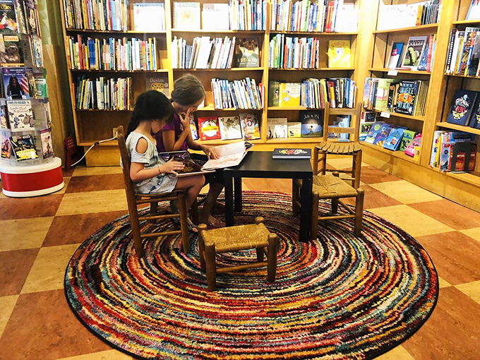 Where young readers discover worlds beyond imagination. That colorful rug has witnessed countless "just one more page" negotiations between parents and enchanted children.