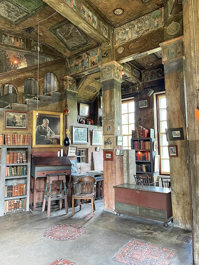 Not your average home office. Books, artifacts, and enough architectural character to make modern minimalists question their life choices.