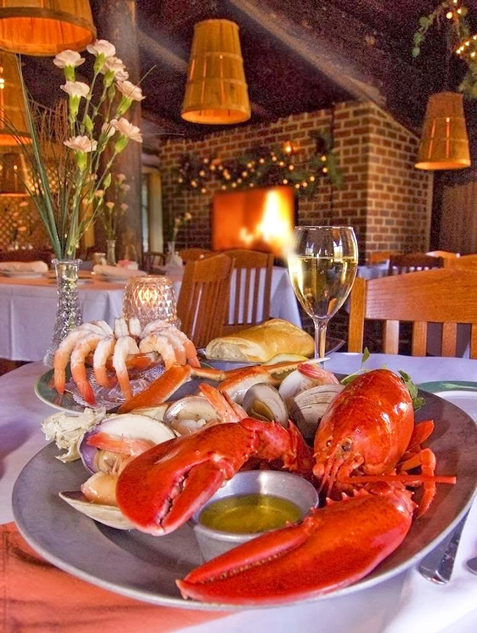Lobster that looks like it's posing for its seafood glamour shot. The brick fireplace in the background promises warmth for both soul and butter sauce.