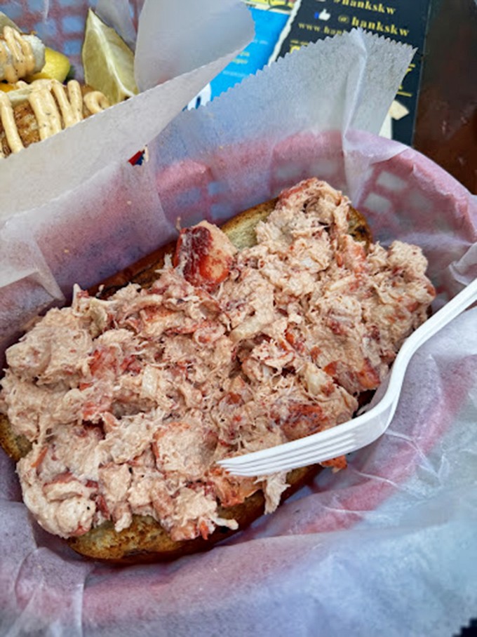 Lobster roll nirvana! Chunks of sweet meat nestled in a buttery vessel &ndash; the kind of simple perfection that makes you close your eyes with each bite.