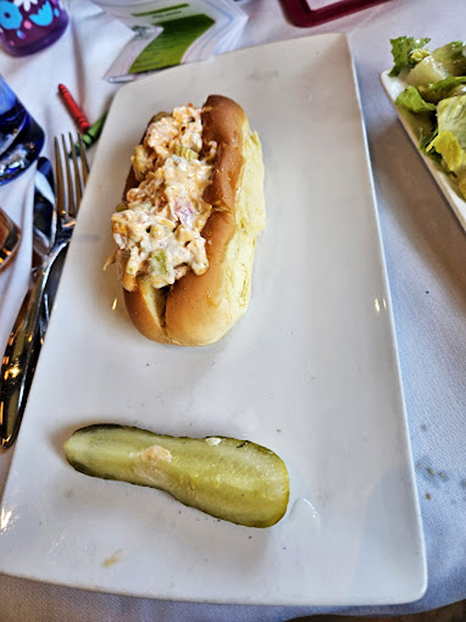The lobster tail entree arrives like royalty on a throne of mashed potatoes, with asparagus courtiers standing at attention. 